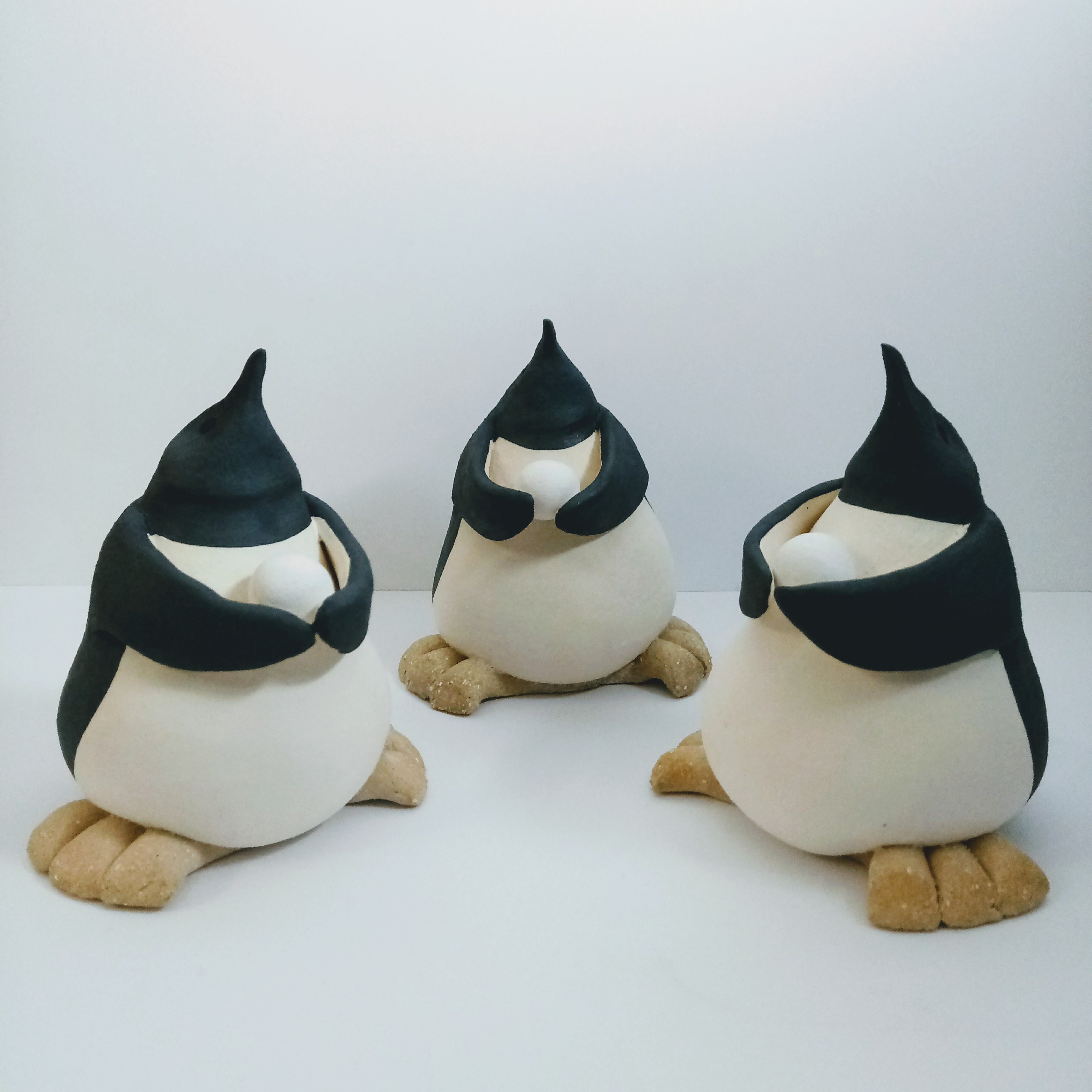 small ceramic penguins holding snowballs by BIGFEETSOFCLAY - British ...